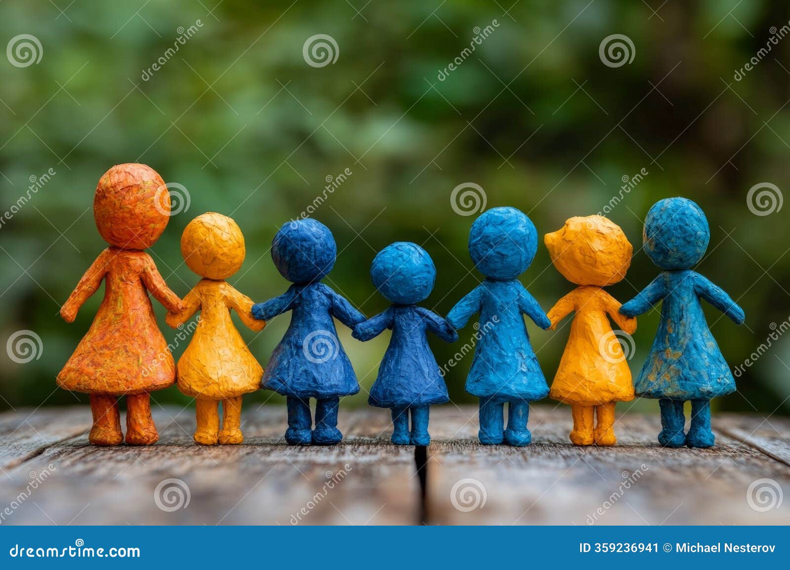 Colorful Paper Dolls are Holding Hands, Symbolizing Unity, Diversity ...