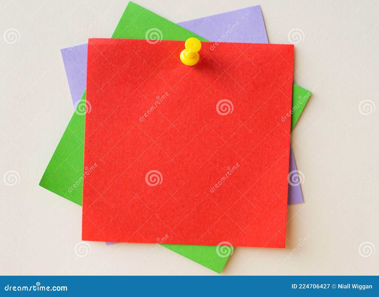 Colorful Paper Notes Stacked Together and Pinned on the Wall. Different ...