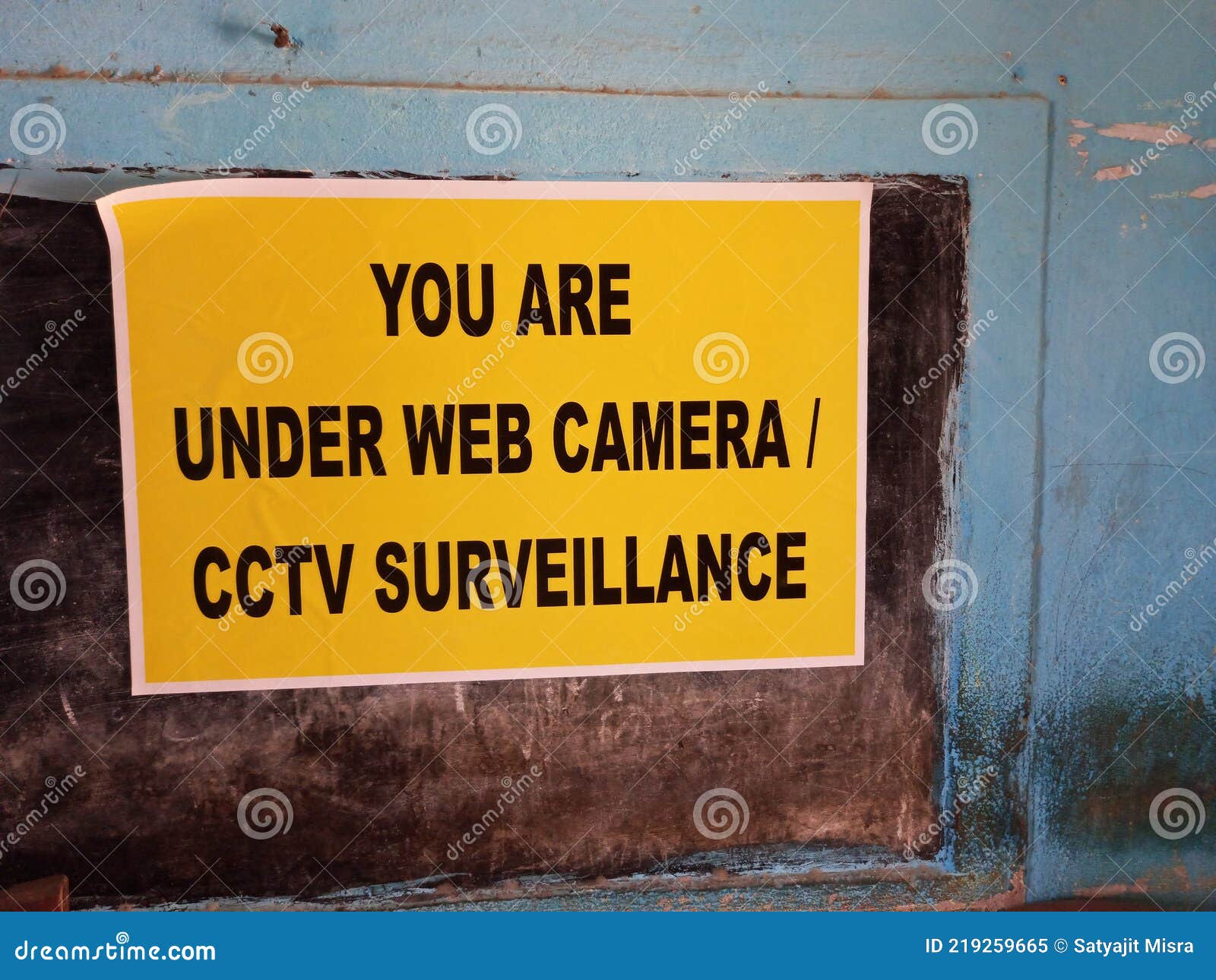 A Colorful Paper Notice Mentioning that we are Under Web or Cctv Camera ...