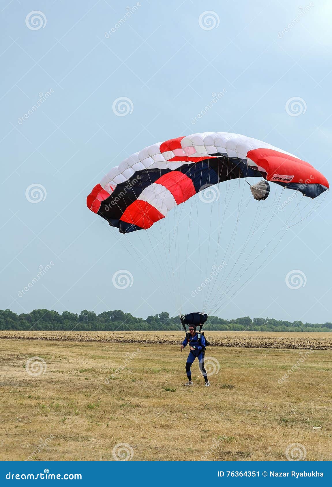 Colorful Parachute Landing As Storm is Coming Editorial Photo - Image ...