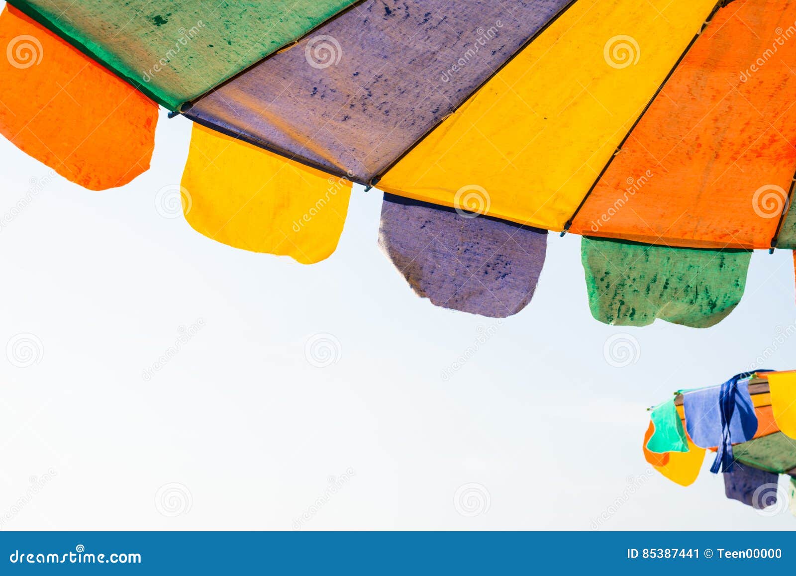 Colorful Parasol on the Beach Stock Image - Image of blue, beach: 85387441