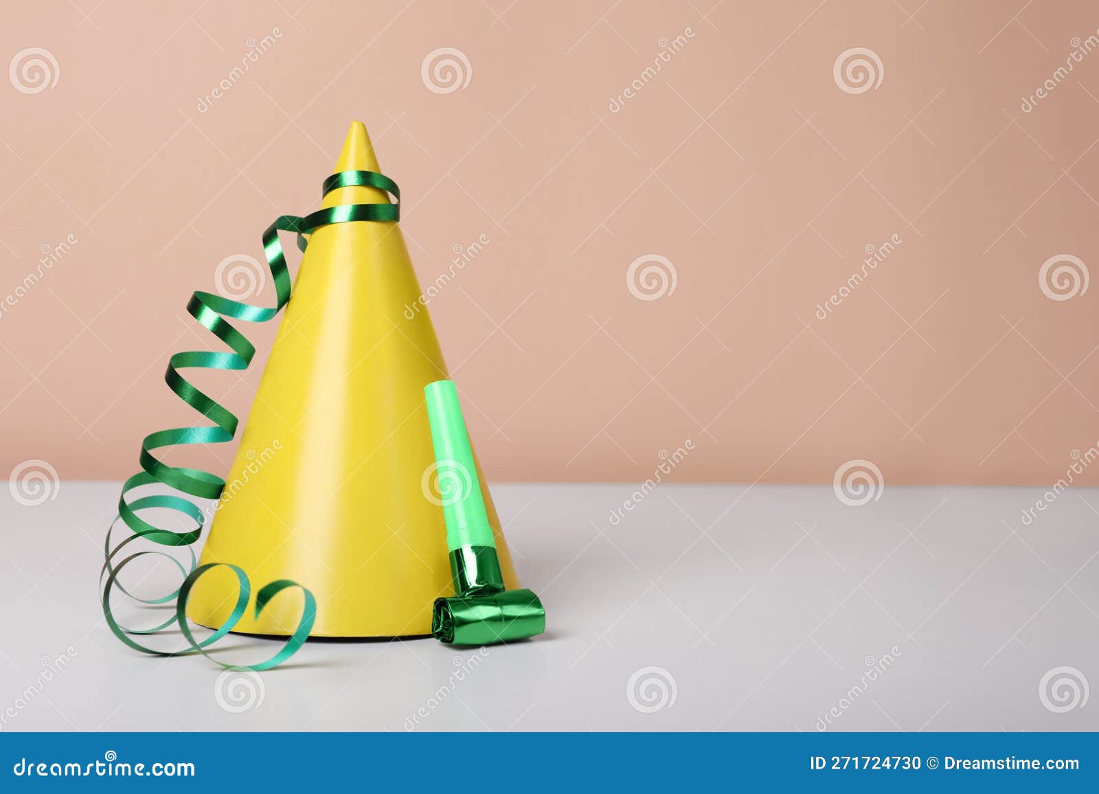 Colorful Party Hat, Streamer and Blower on White Table, Space for Text ...