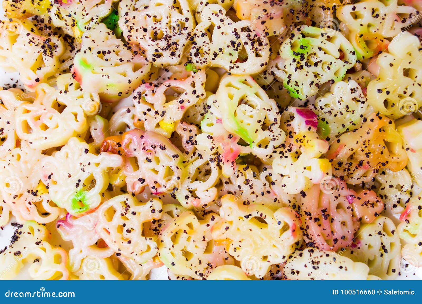 Colorful Pasta with Poppy Seeds on a Plate Stock Photo - Image of ...