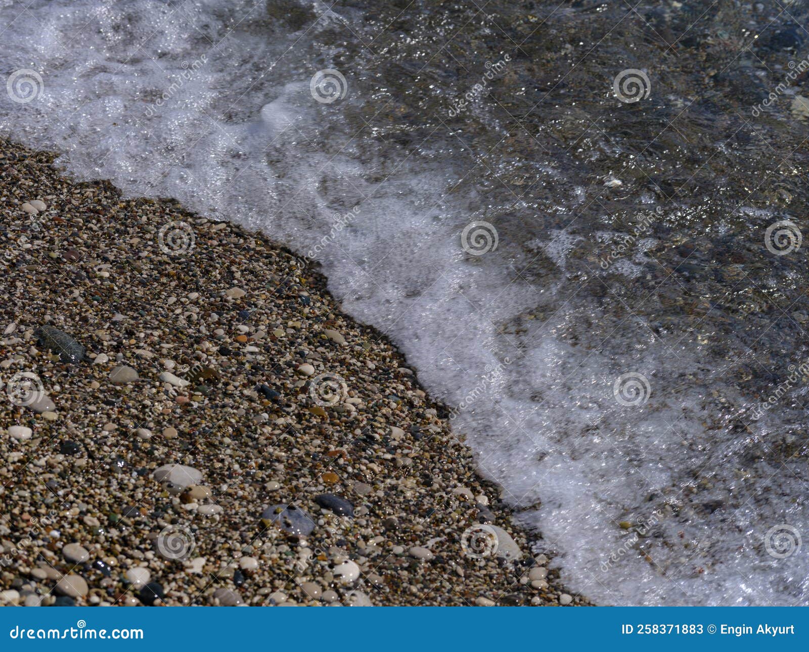 Pebbles and sea waves stock image. Image of stone, ocean - 258371883