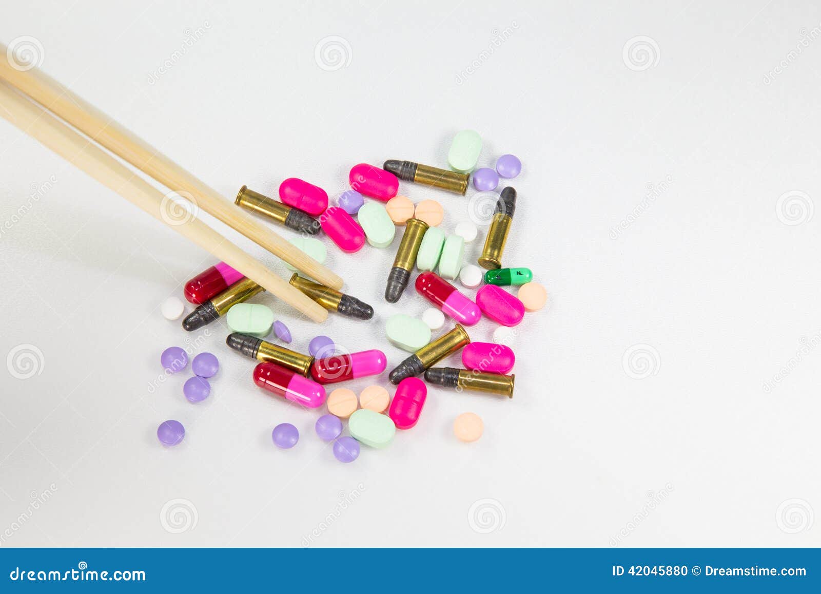 Colorful Pills and Bullet on White Background Stock Photo - Image of ...