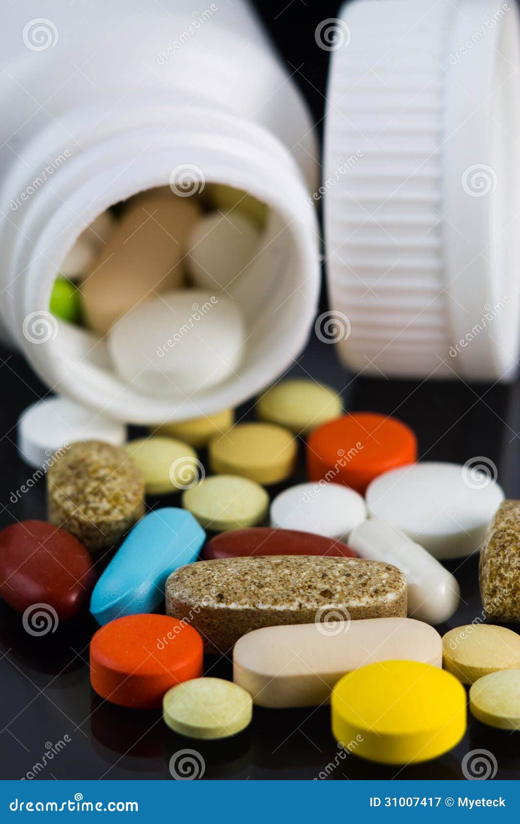 Colorful Pills Scattered from White Bottle Stock Image - Image of ...