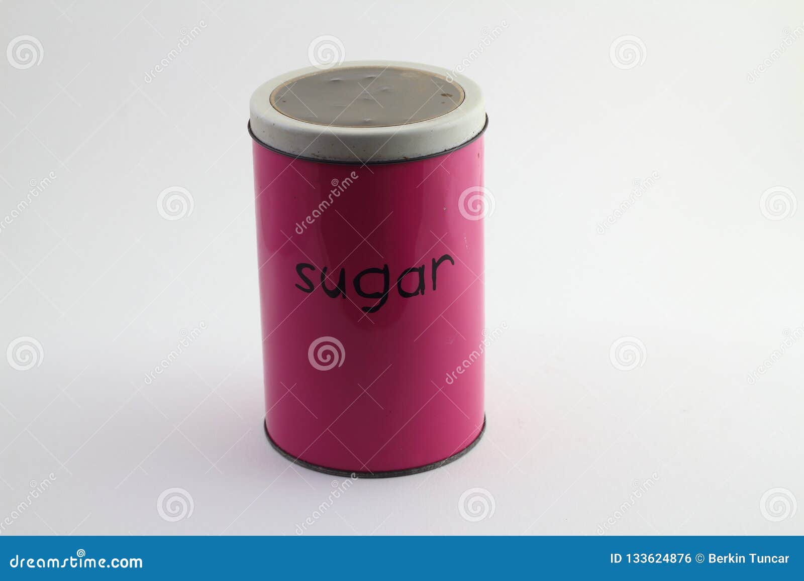 Colorful Pink Tin Storage Container on Floral Pattern Stock Photo ...