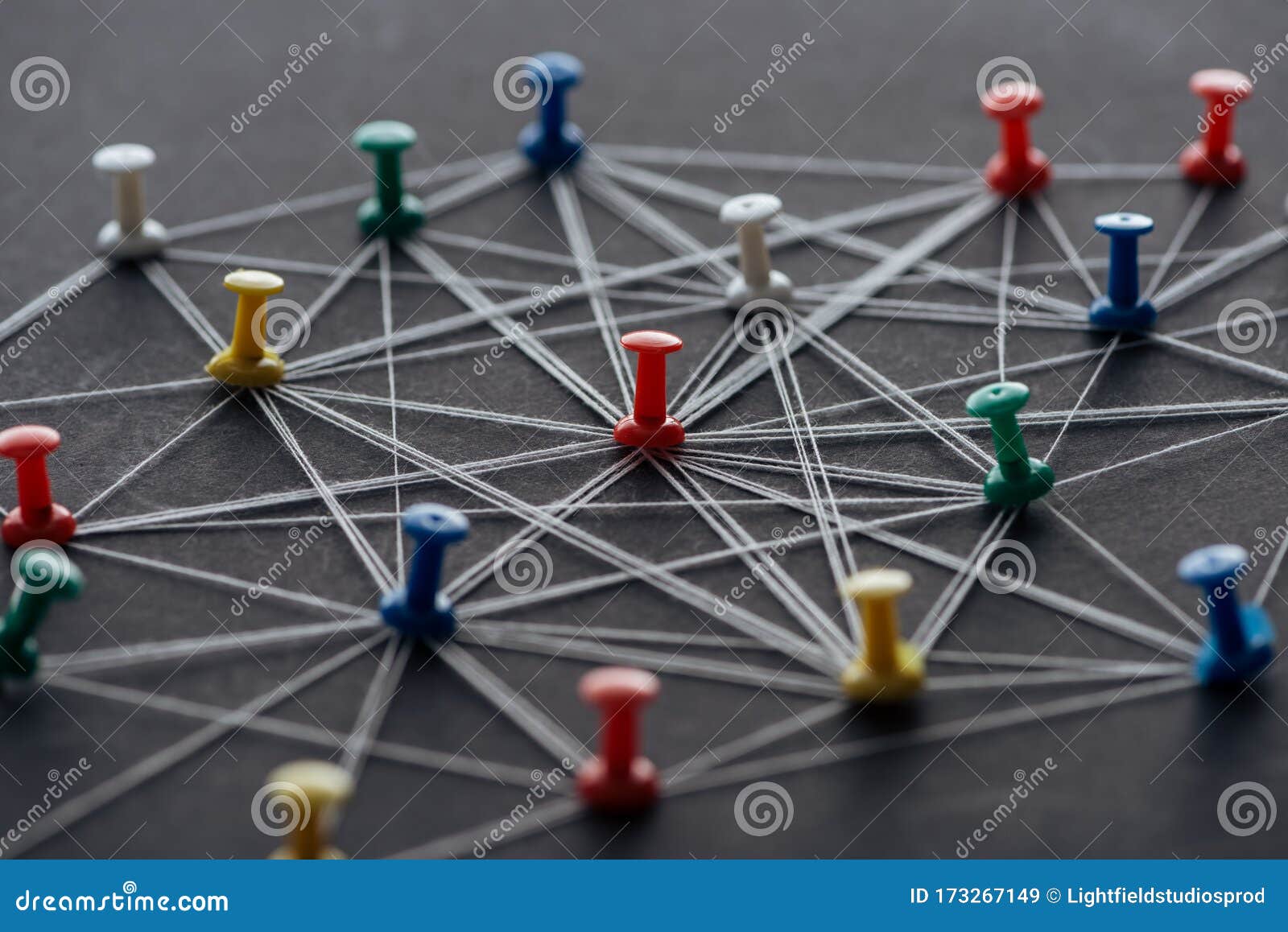 Colorful Pins Connected with Strings Isolated on Grey, Network Concept ...