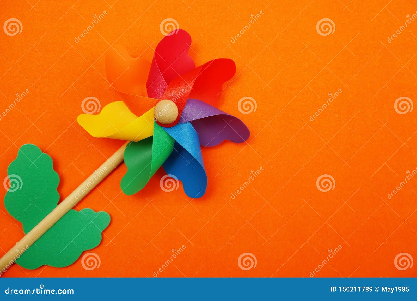 Colorful Pinwheel with Space Copy Isolated on Orange Background Stock ...