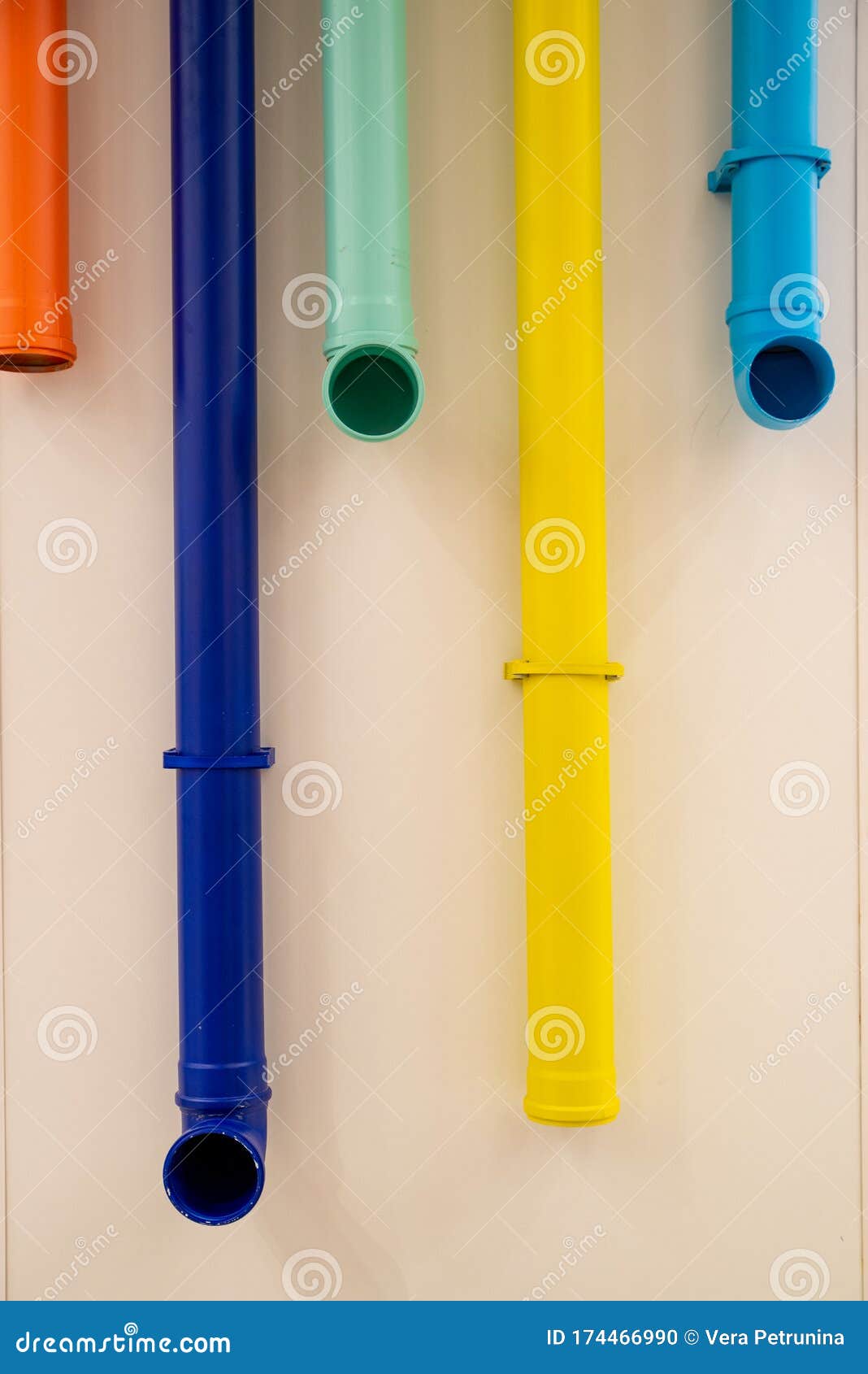 Colorful pipes on the wall stock photo. Image of colorful - 174466990