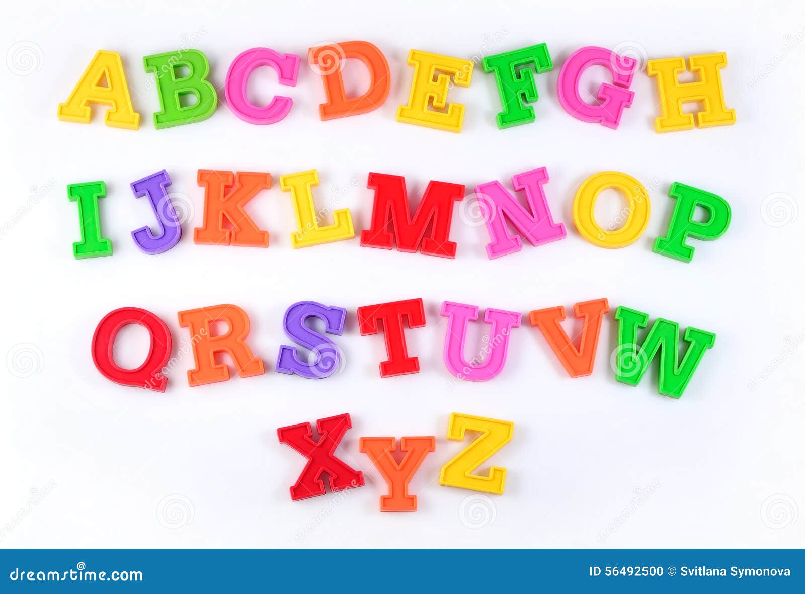 Colorful Plastic Alphabet Letters on a White Stock Photo - Image of ...