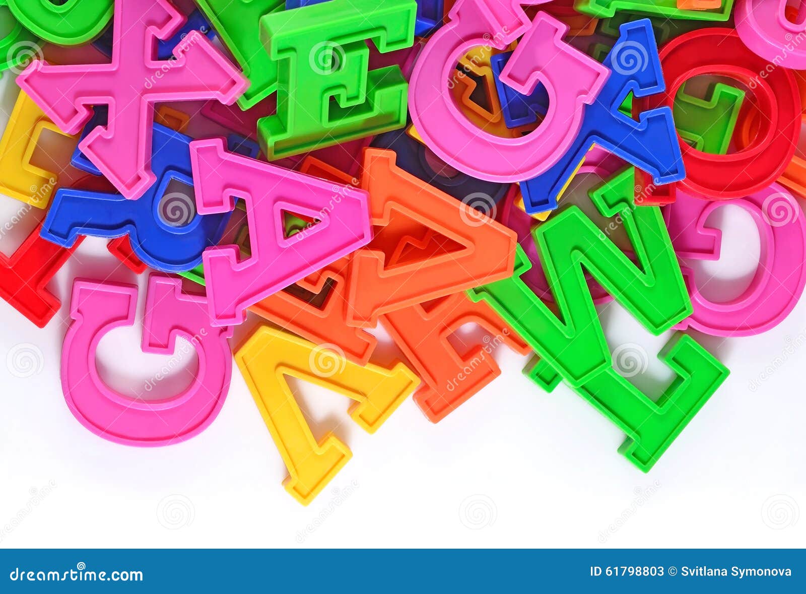 Colorful Plastic Alphabet Letters on a White Stock Illustration ...