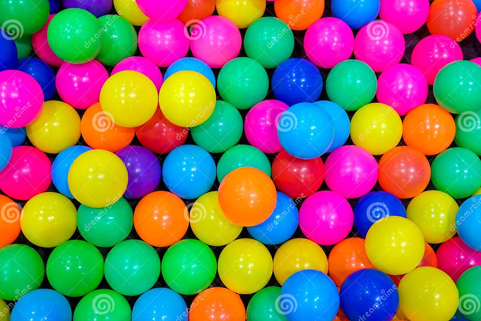 Colorful plastic ball stock photo. Image of ballpit, texture - 79536152