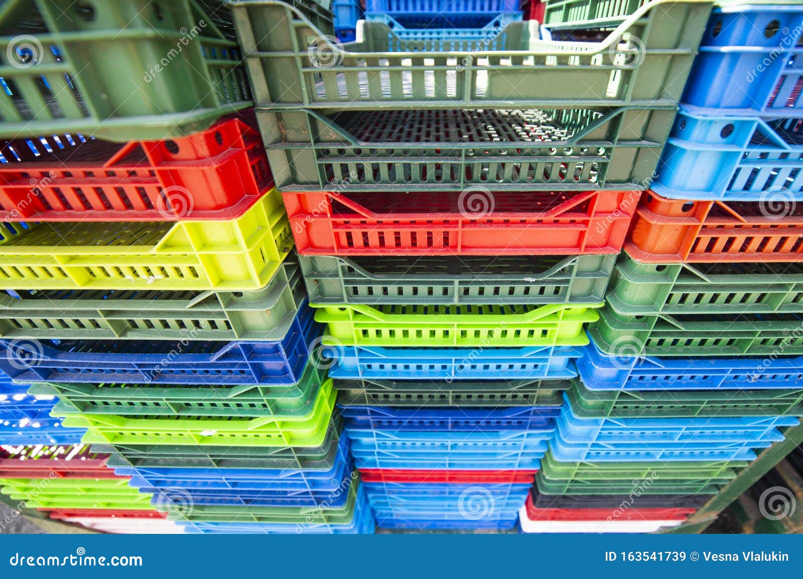 Colorful Plastic Boxes Stacked One upon the Other Stock Image - Image ...