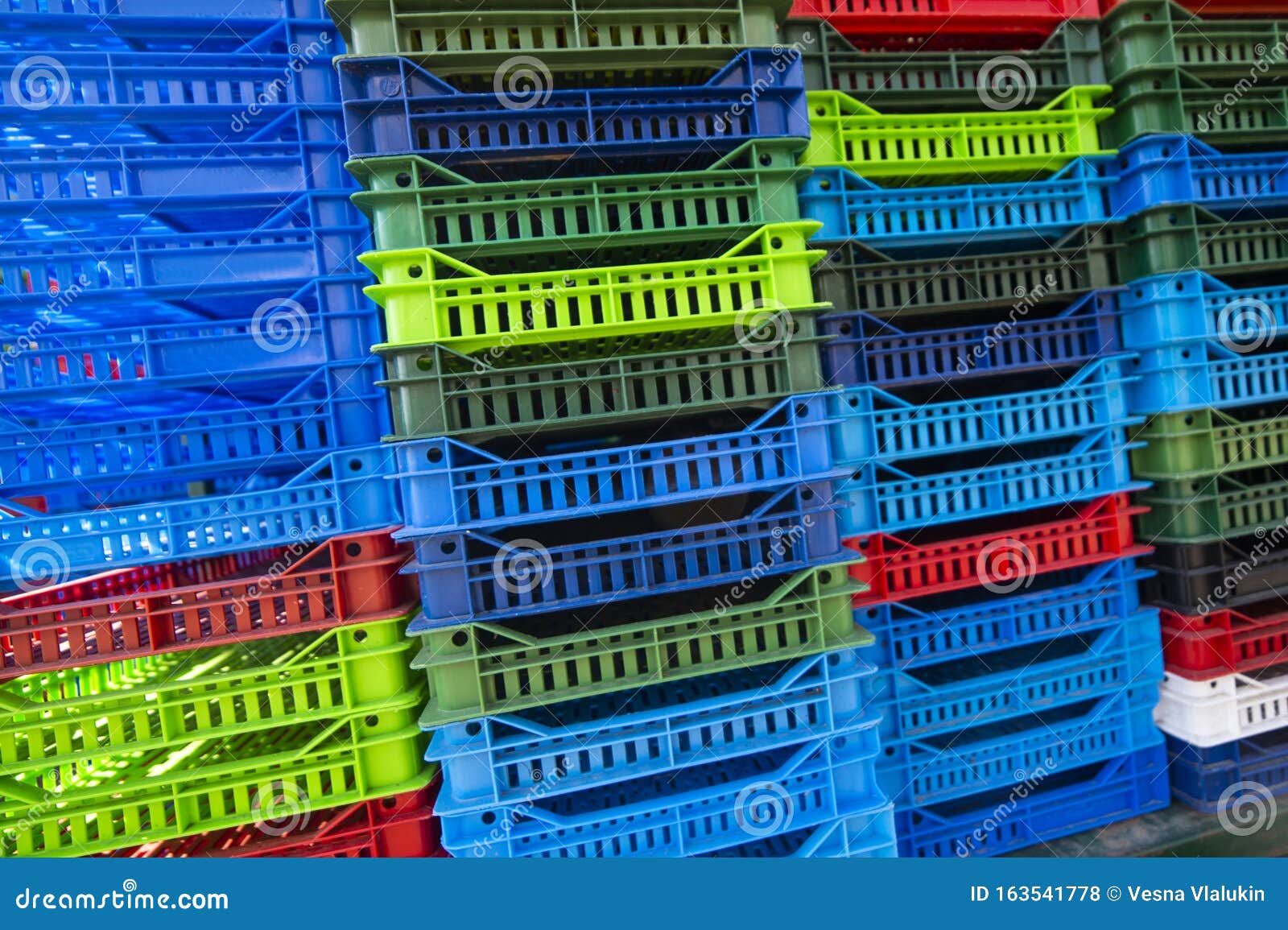 Colorful Plastic Boxes Stacked One upon the Other Stock Photo - Image ...