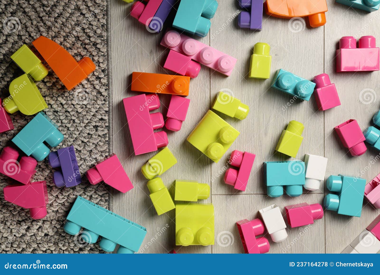 Colorful Plastic Building Blocks on Floor, Flat Lay Stock Photo - Image ...