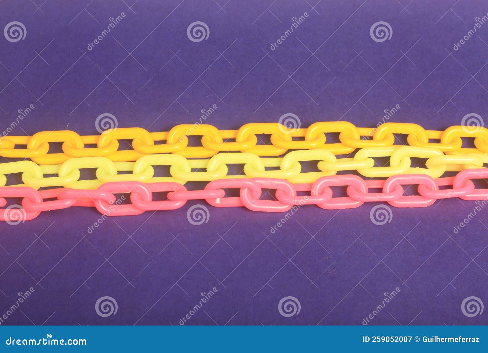 Colorful Plastic Chains on a Blue Background Stock Image - Image of ...
