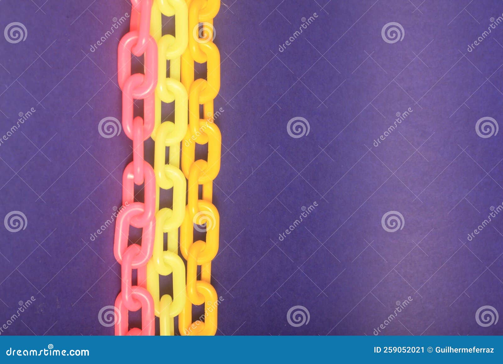 Colorful Plastic Chains on a Blue Background Stock Image - Image of ...