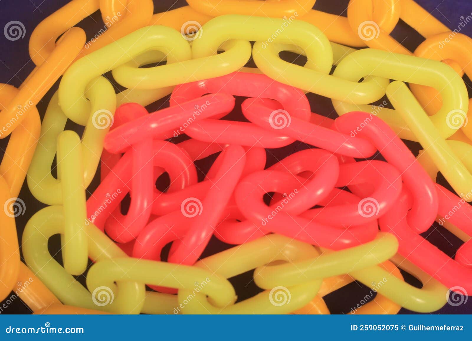 Colorful Plastic Chains on a Blue Background Stock Image - Image of ...