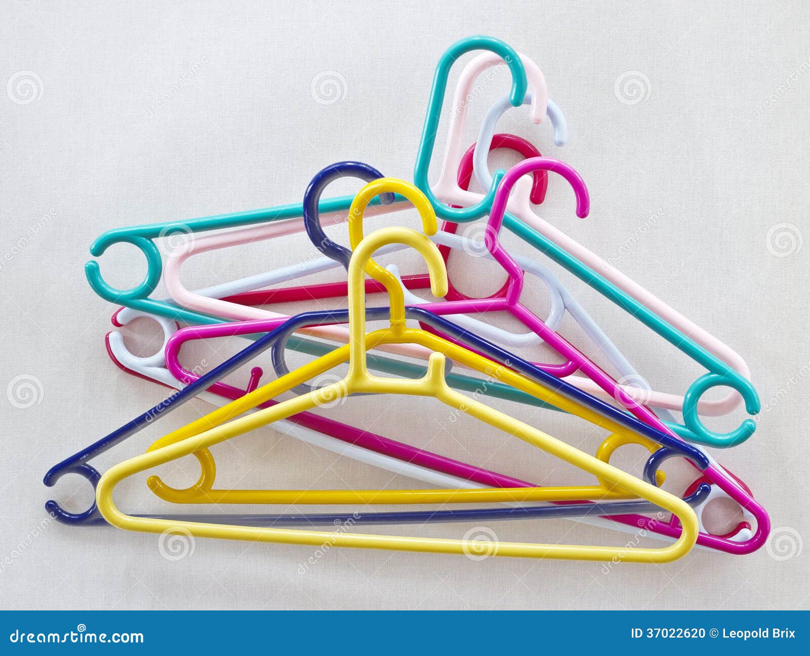 Colorful Plastic Clothes Hanger Stock Photo - Image of stack, coloured ...