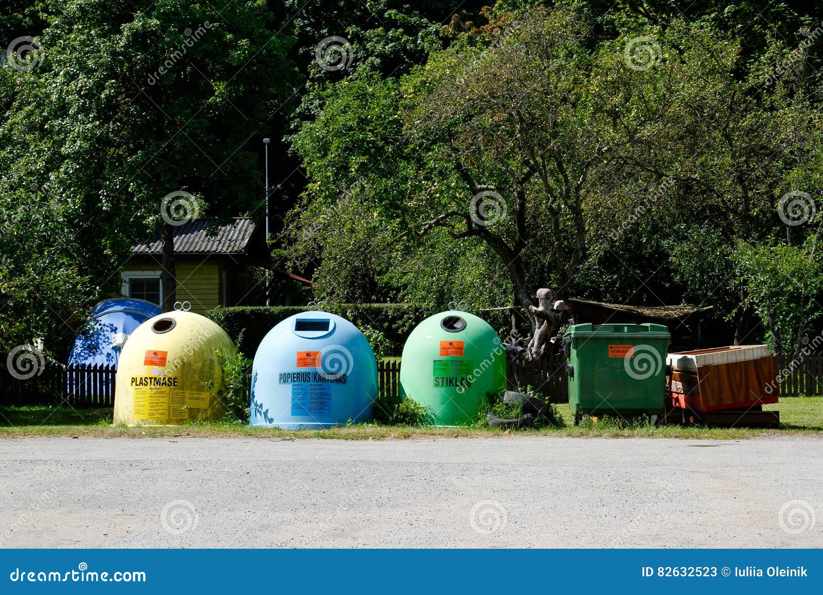 Colorful Plastic Containers in a Row for Separate Garbage Collection ...