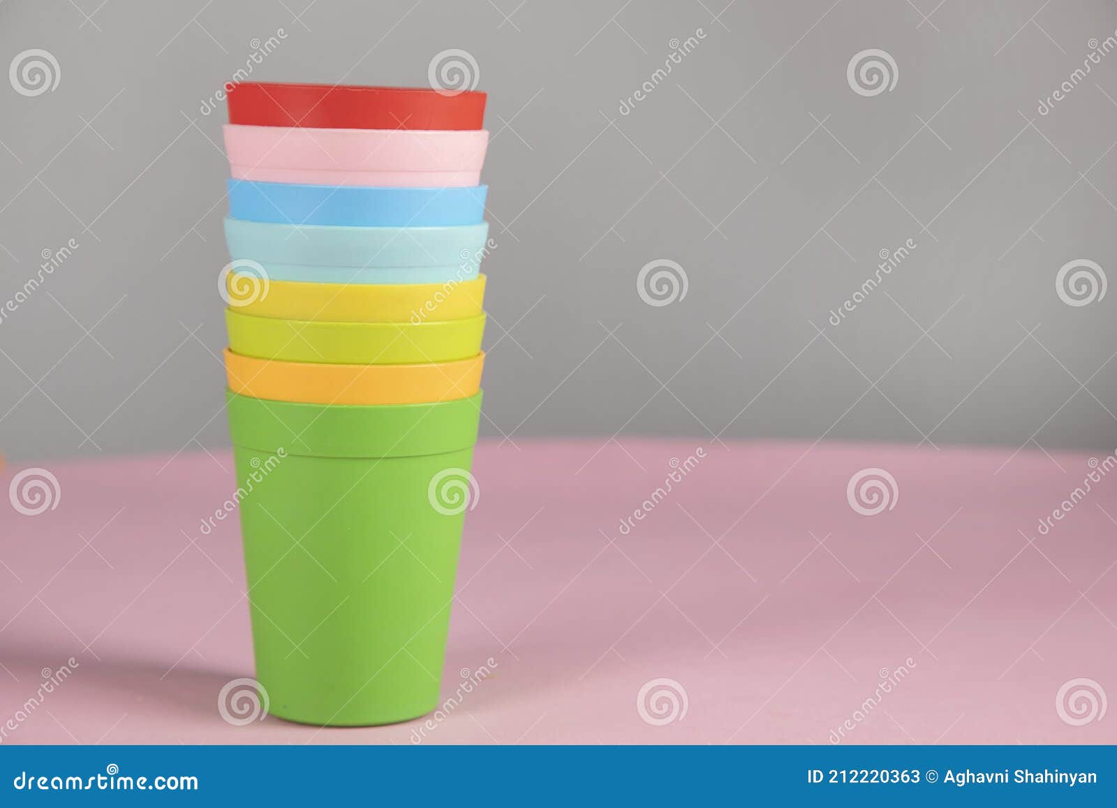 Colorful Plastic Cups on Table Stock Image - Image of green, group ...