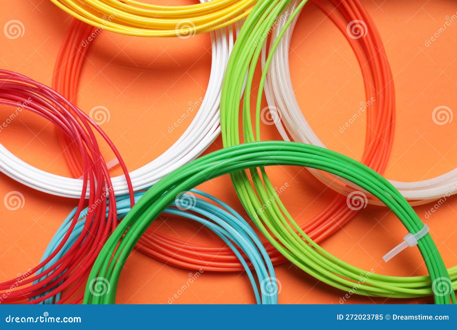 Colorful Plastic Filaments on Orange Background, Flat Lay Stock Image ...