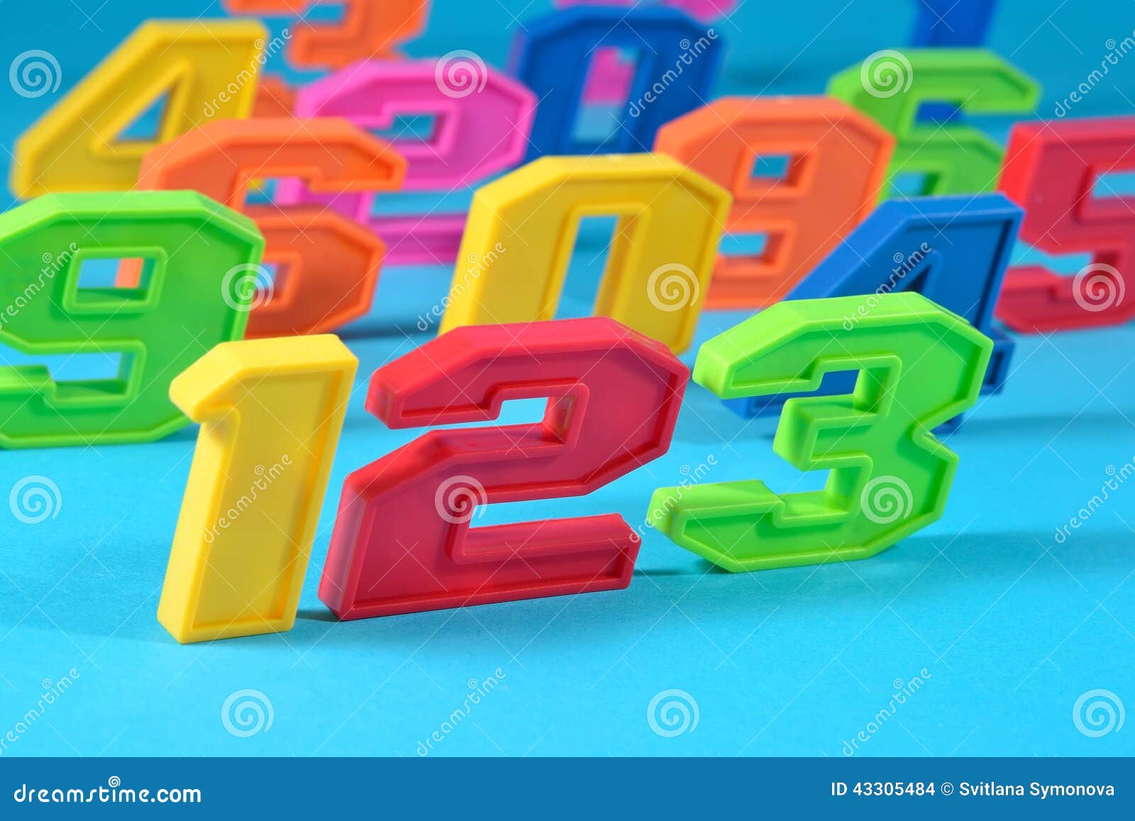 Colorful Plastic Numbers 123 on a Blue Background Stock Photo - Image ...
