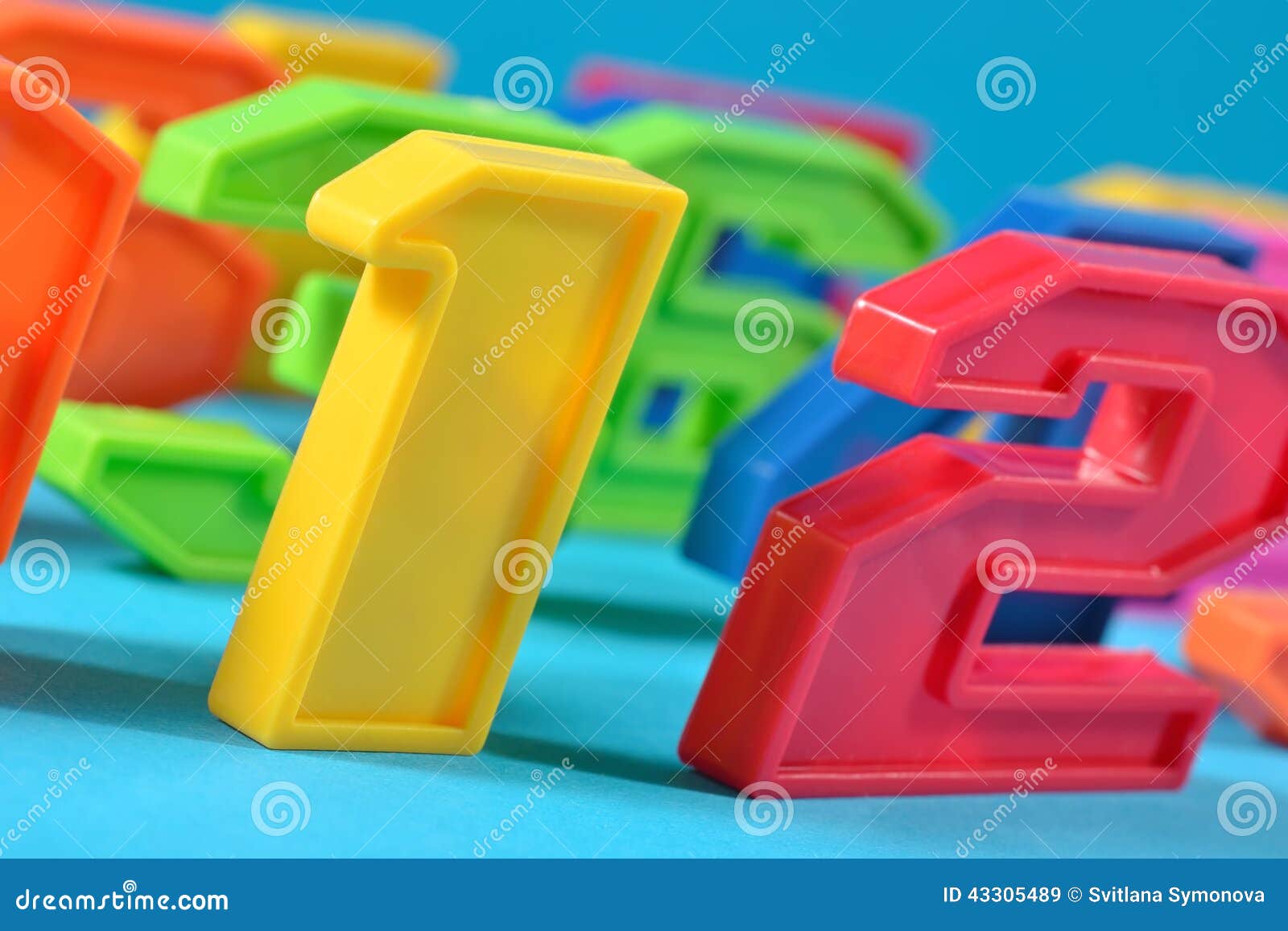 Colorful Plastic Numbers On A Blue Background Royalty-Free Stock Photo ...