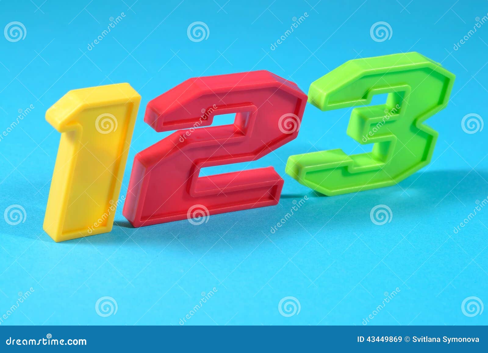 Colorful Plastic Numbers 123 on a Blue Background Stock Image - Image ...