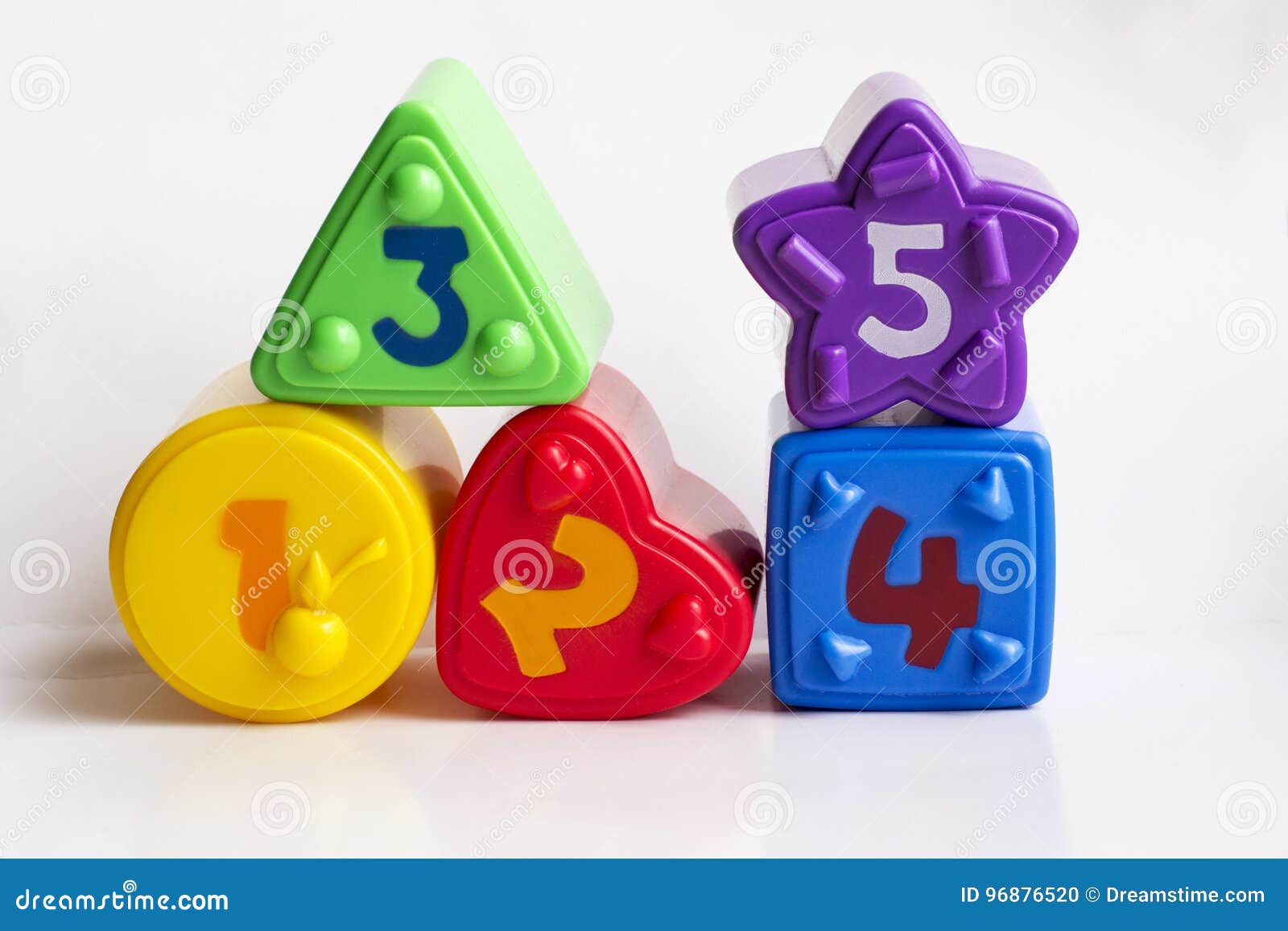 Colorful Plastic Shapes with Numbers on a White Background Stock Photo ...