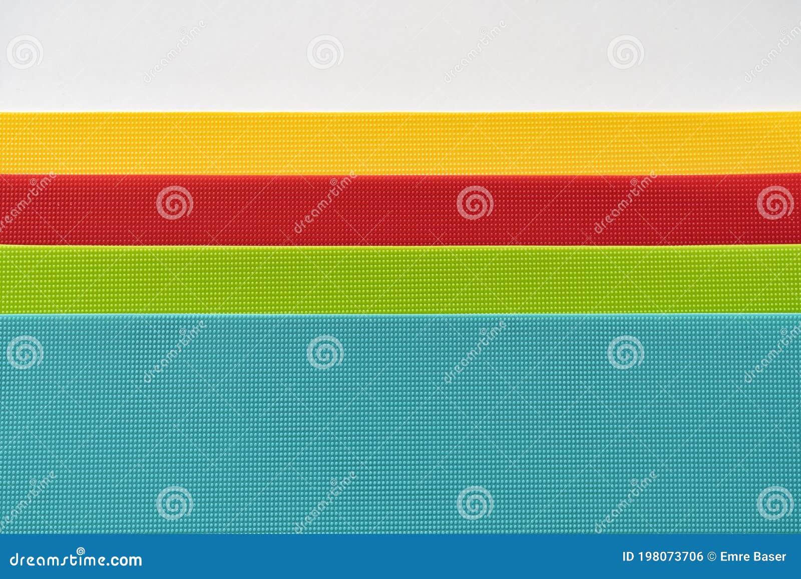 Colorful Plastic Sheets with Tiny Dots on a White Background Stock ...