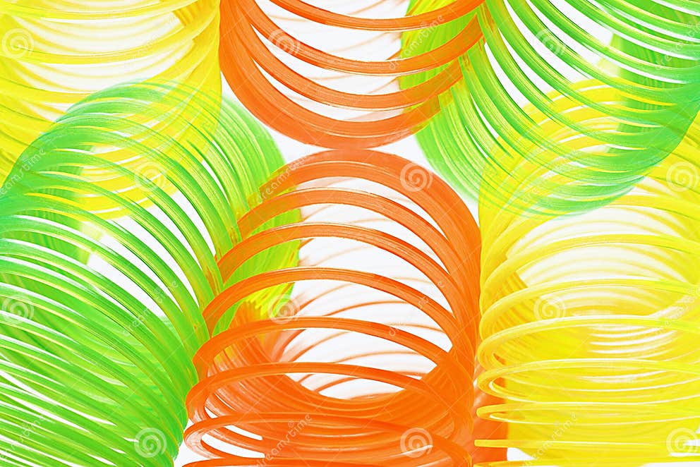 Colorful Slinkies editorial stock image. Image of stretching - 30102504