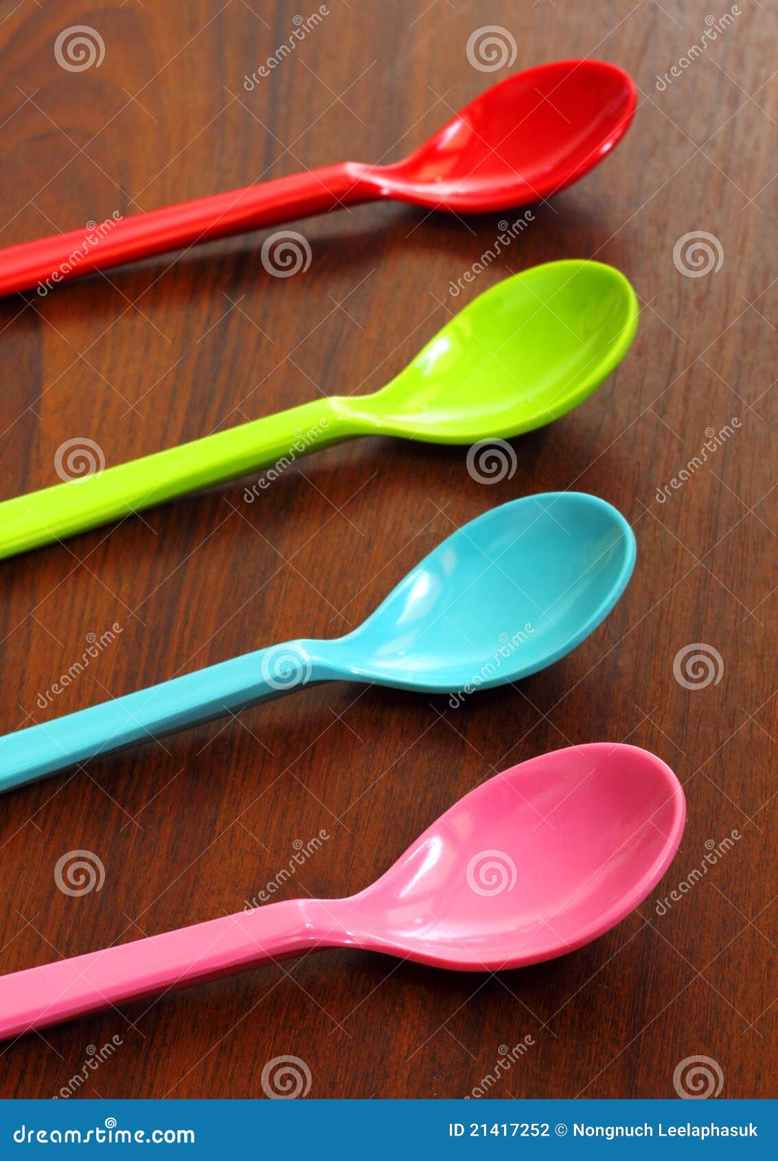 Colorful plastic spoons stock photo. Image of kitchenware - 21417252