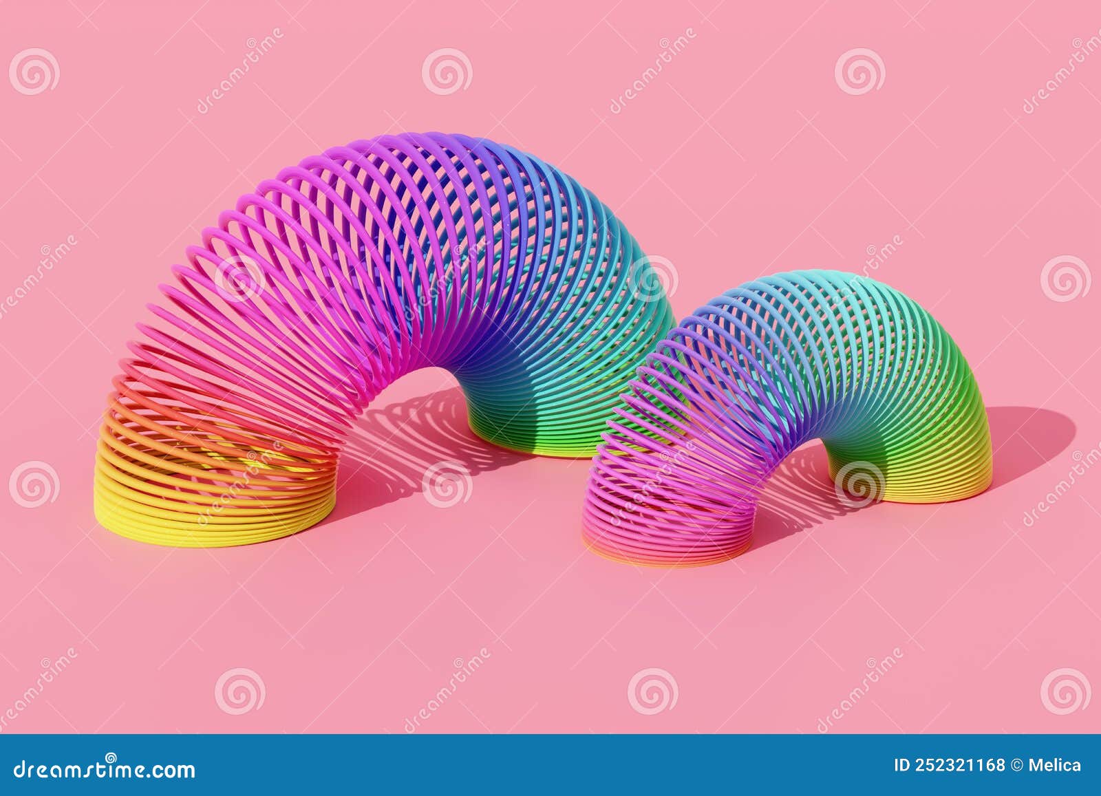 Colorful Plastic Spring Toys on Pink Background. Editorial Stock Photo ...