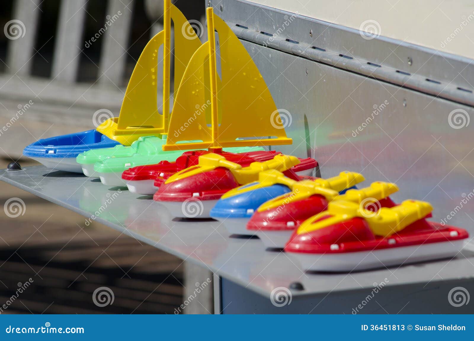 Colorful plastic toy boats stock image. Image of sailboat - 36451813