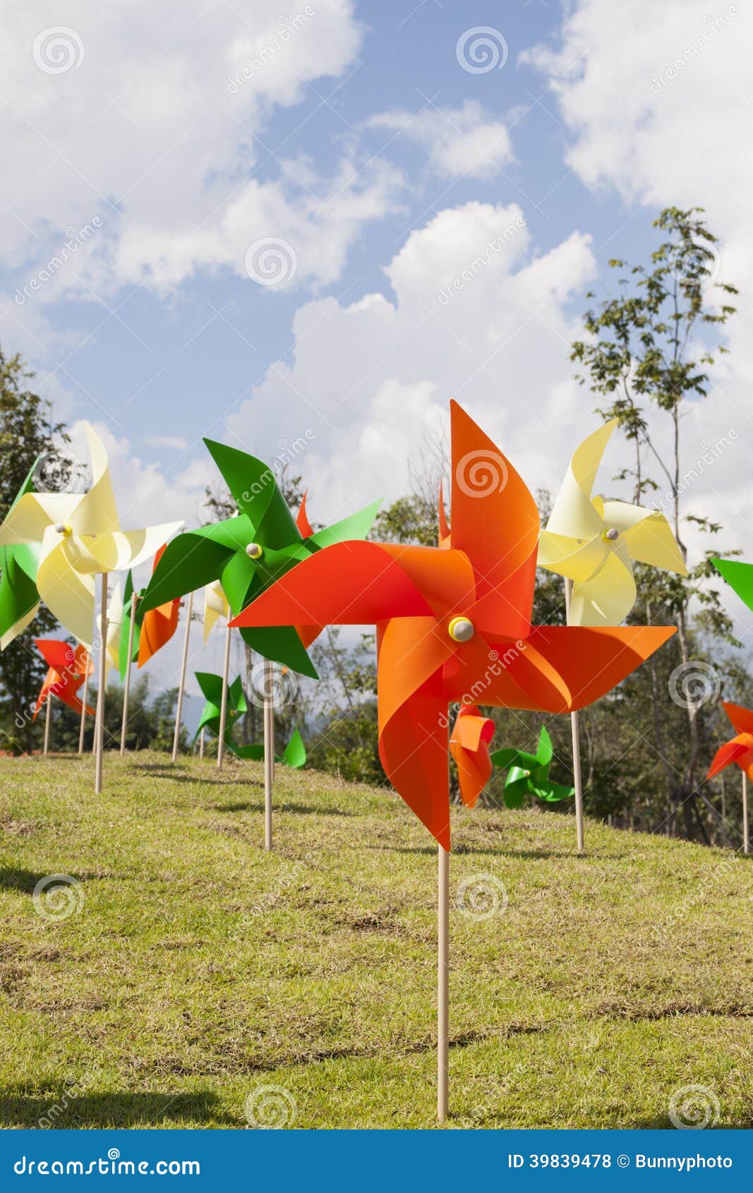 Colorful Plastic Wind Wheels Stock Photo - Image of orange, bright ...
