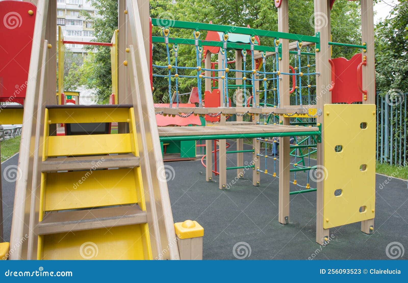 Colorful Playground in the Yard in the Park. Safe Playground for ...