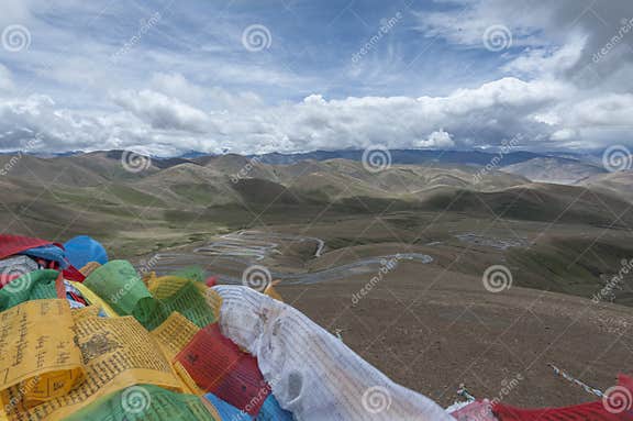 Colorful Prayer Flags Flutter Above Serpentine Road Across Pang La Pass ... Colorful Prayer Flags Flutter Above Serpentine Road Across Pang La Pass ...