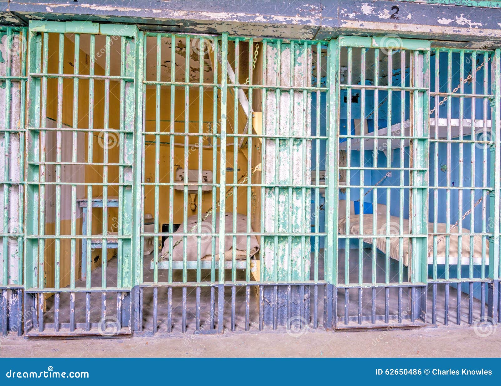 Colorful Prison Cells with Beds and Sink Stock Photo - Image of ...