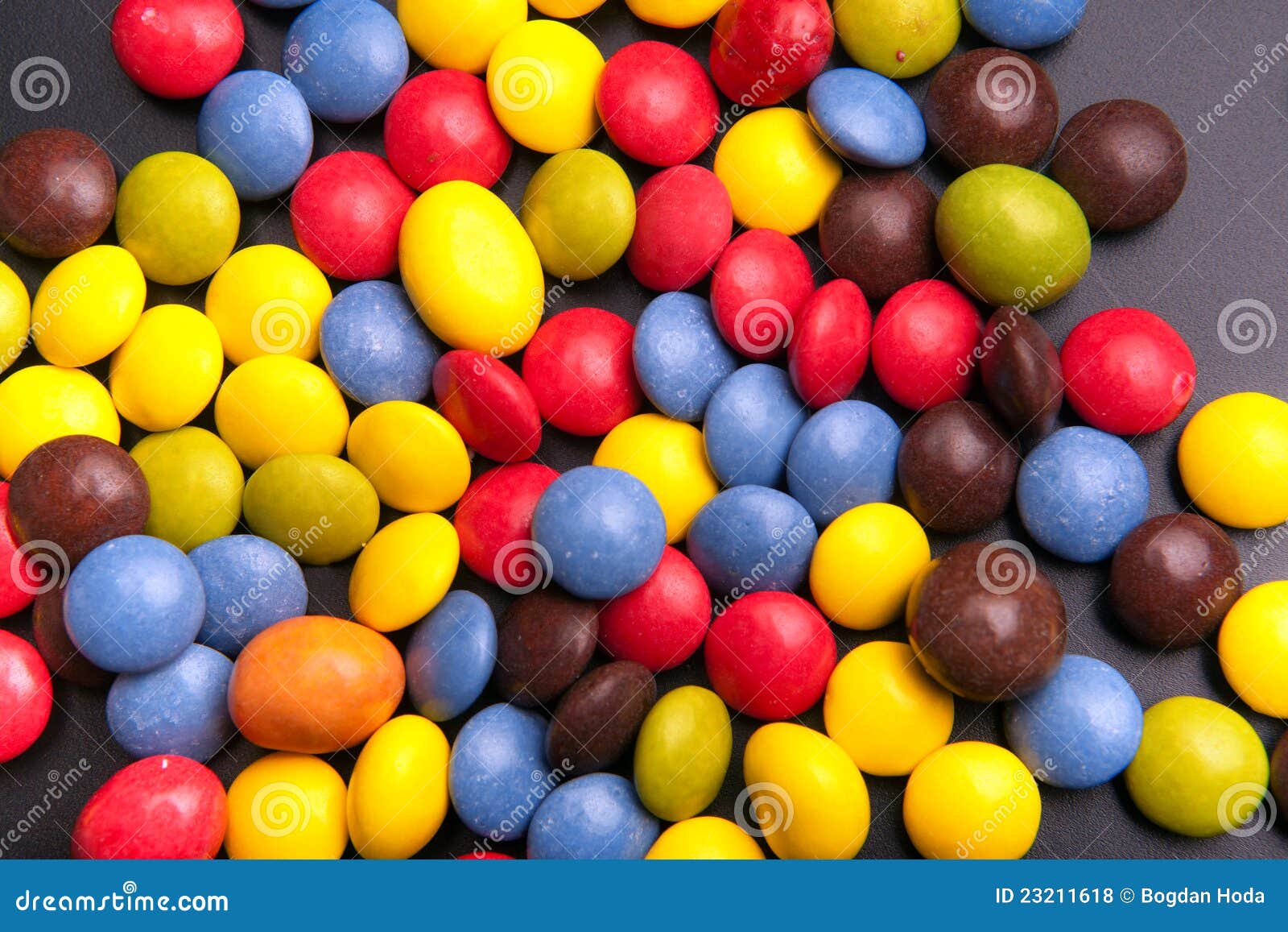 Colorful Random Chocolate Sweets Isolated on Grey Stock Photo - Image ...