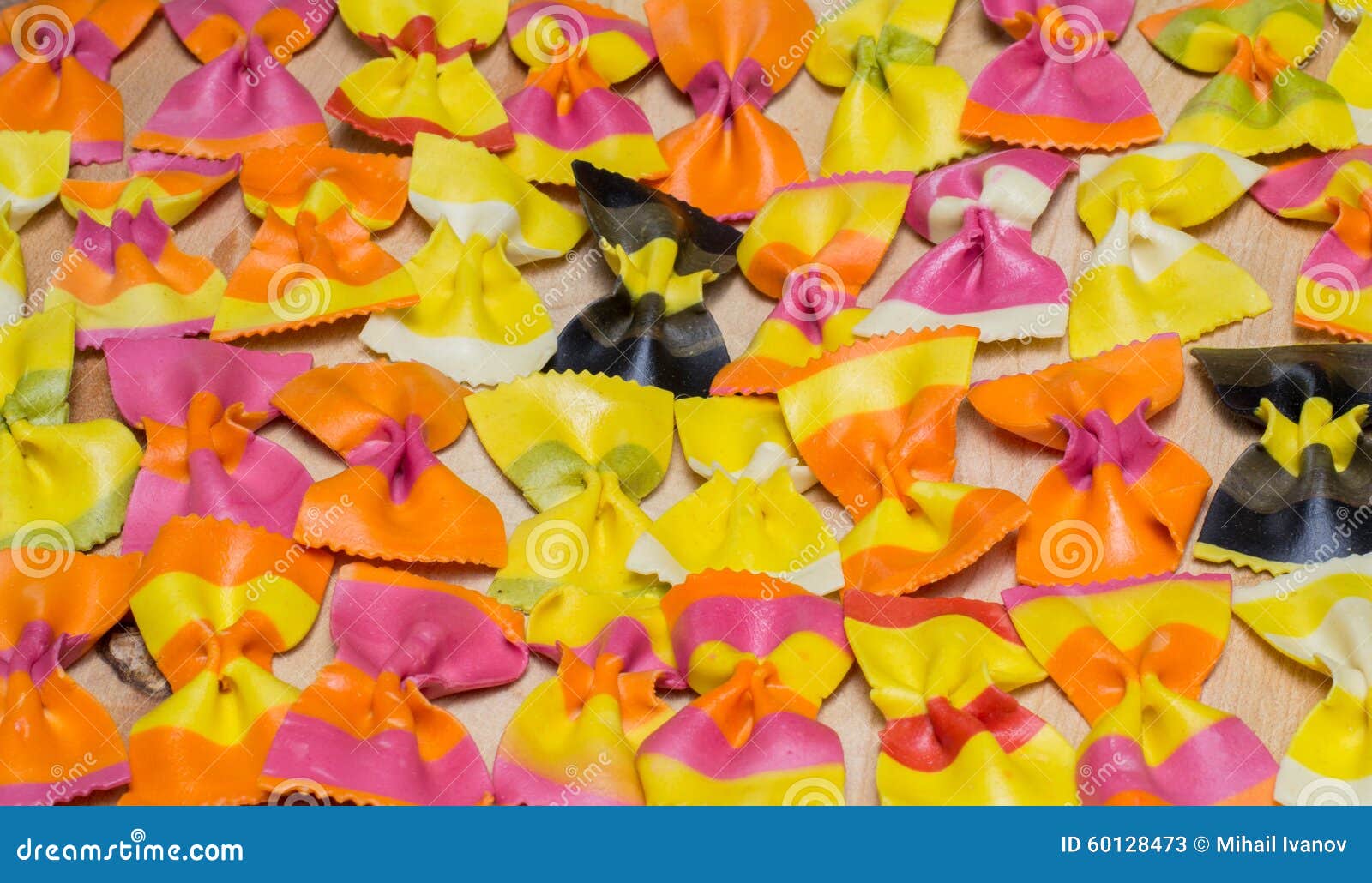 Colorful Ravioli Pasta Decorating a Wooden Surface Stock Image - Image ...