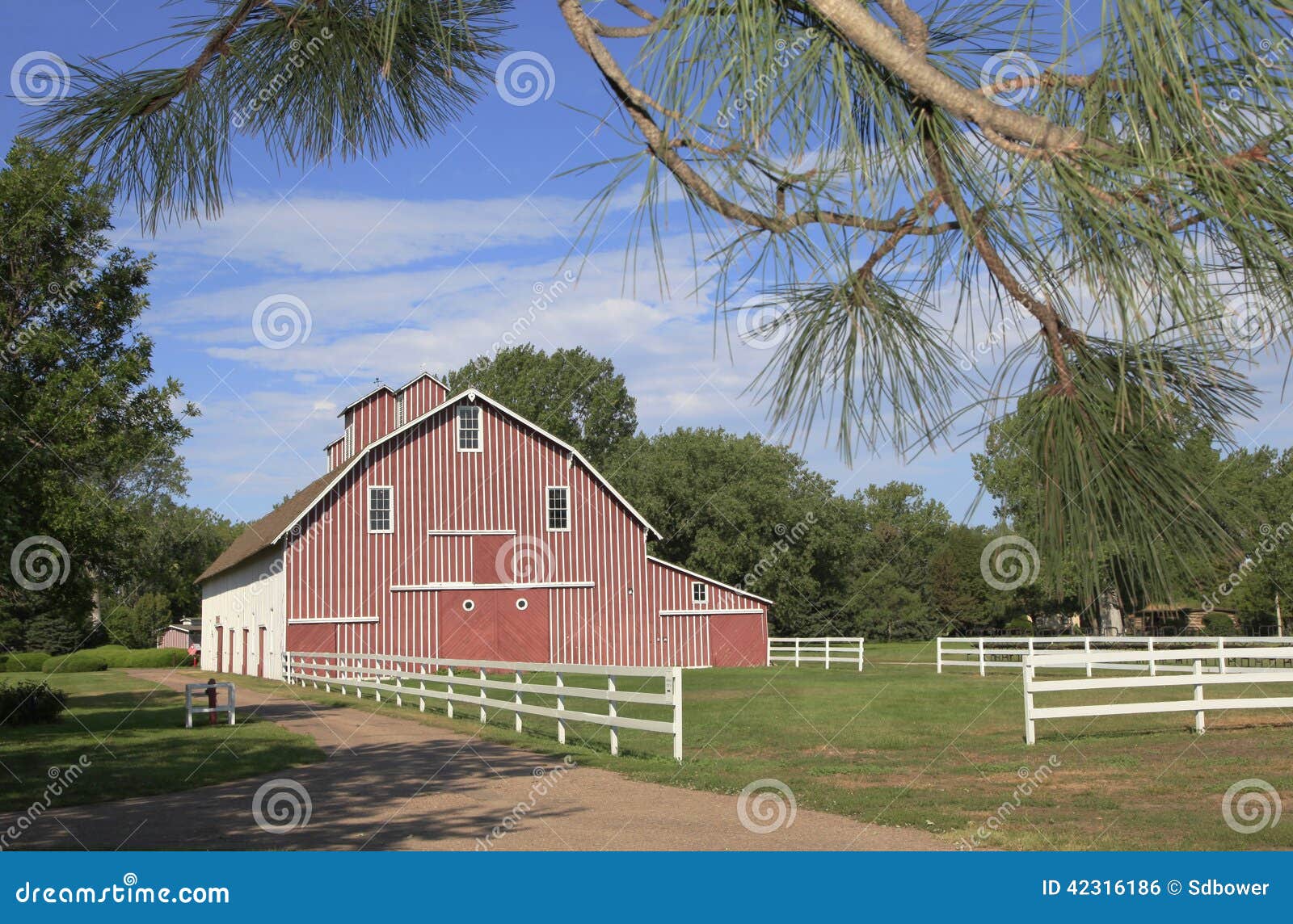 Colorful Red Barn and Fence Stock Photo - Image of nature, pasture ...