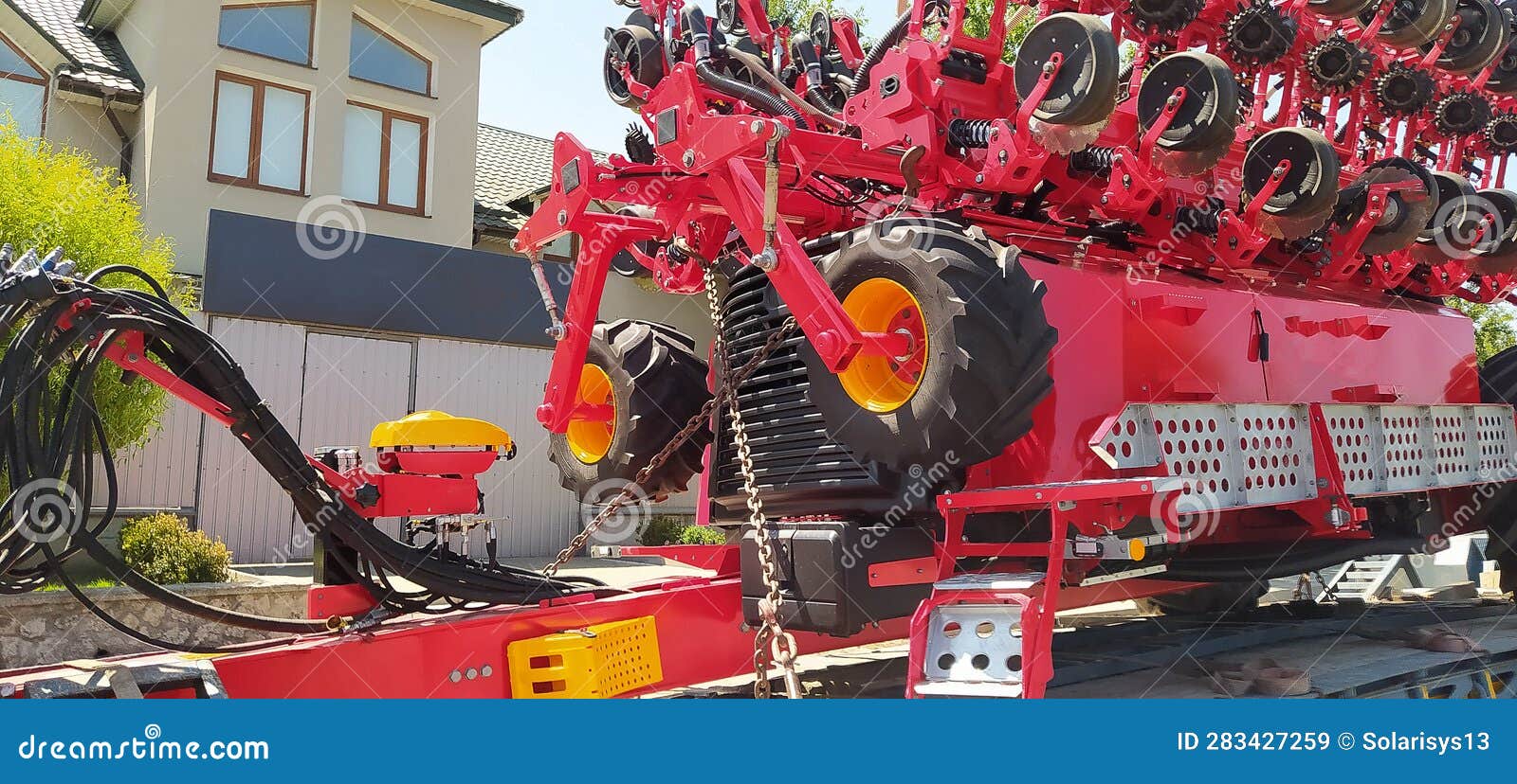 The Colorful Red Seeder on the Ground Stock Image - Image of technology ...