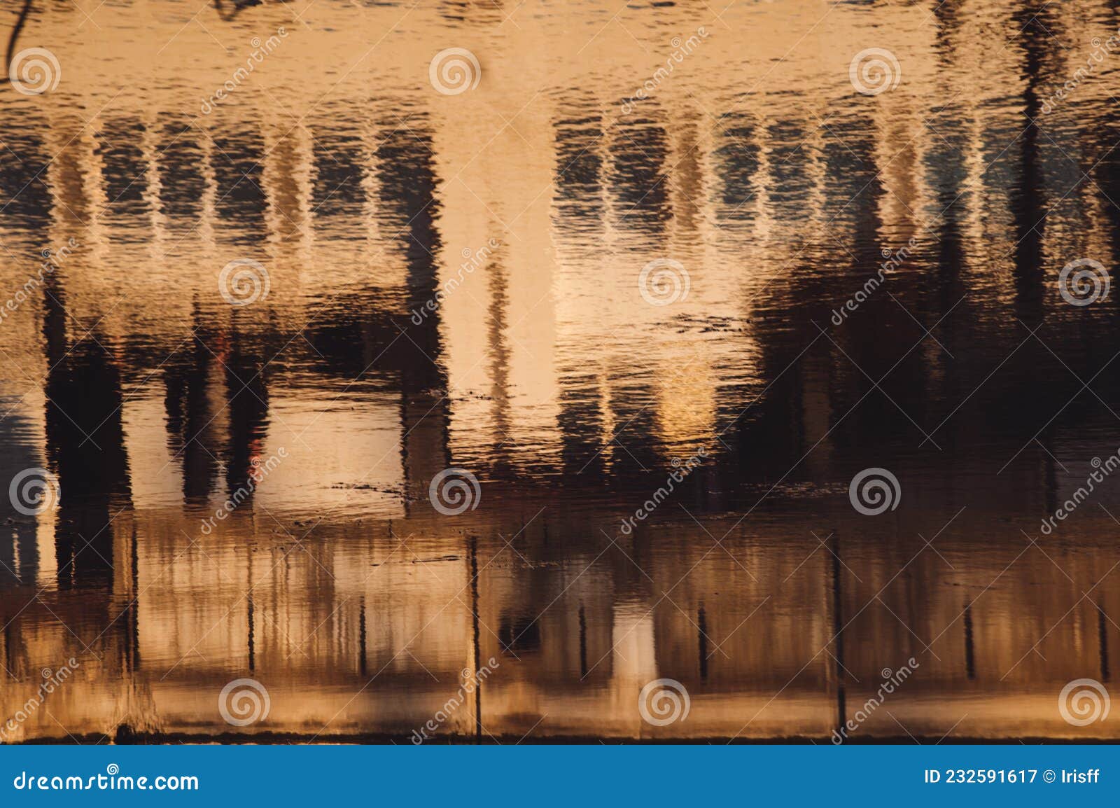 Colorful Reflection of Architectural Building in Water with Ripples ...