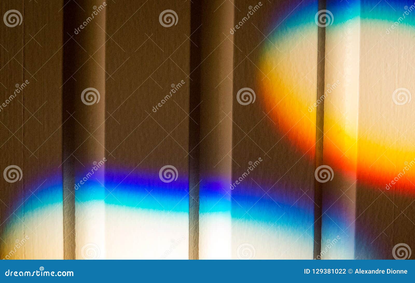 Colorful Refraction of the Sunlight on a Wall Stock Photo - Image of ...
