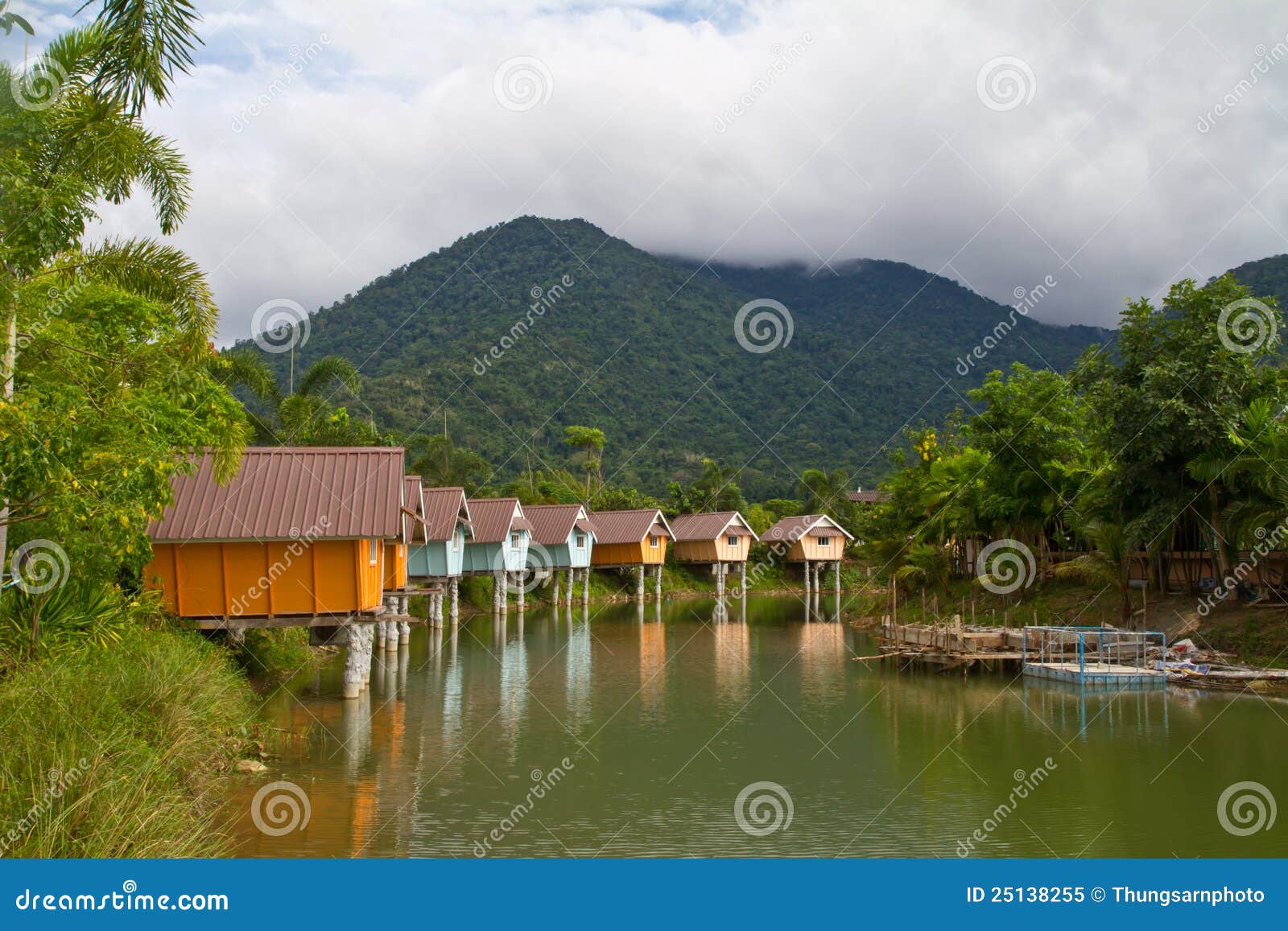 Colorful resort and lake stock image. Image of resort - 25138255