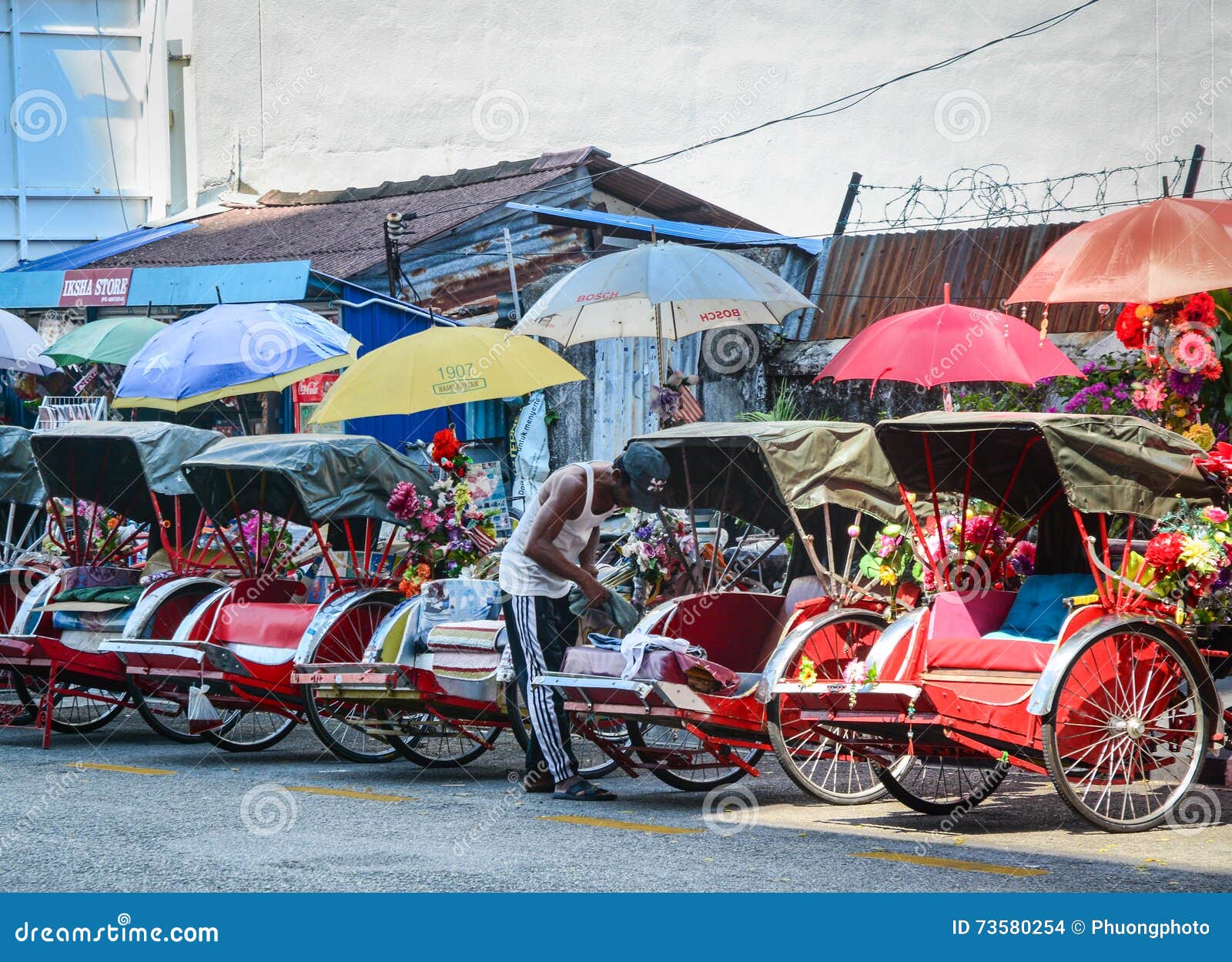 Colorful Rickshaws Waiting for Passengers in Melaka, Malaysia Editorial ...
