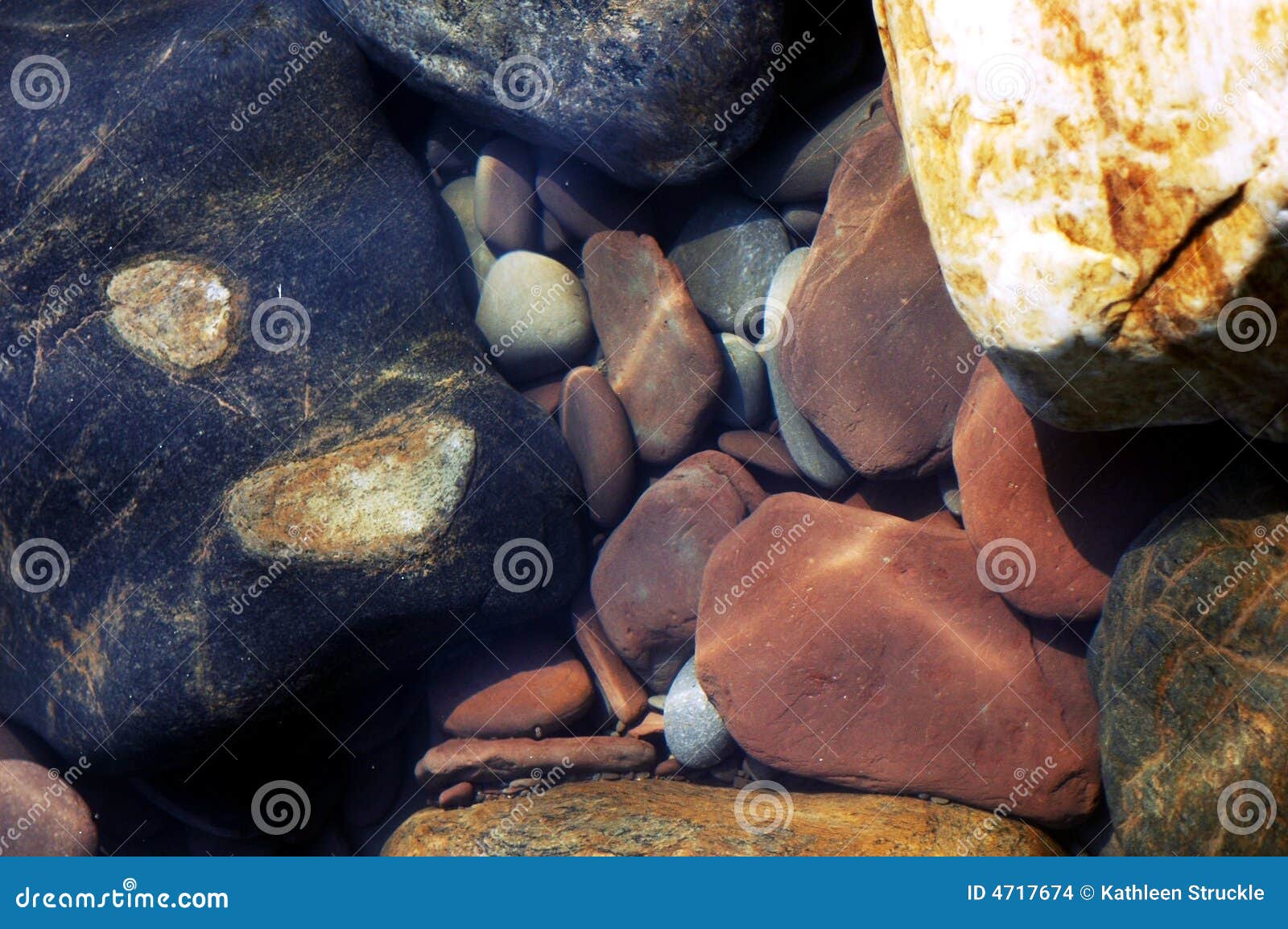 Colorful rocks in lake stock photo. Image of stony, smoothed - 4717674
