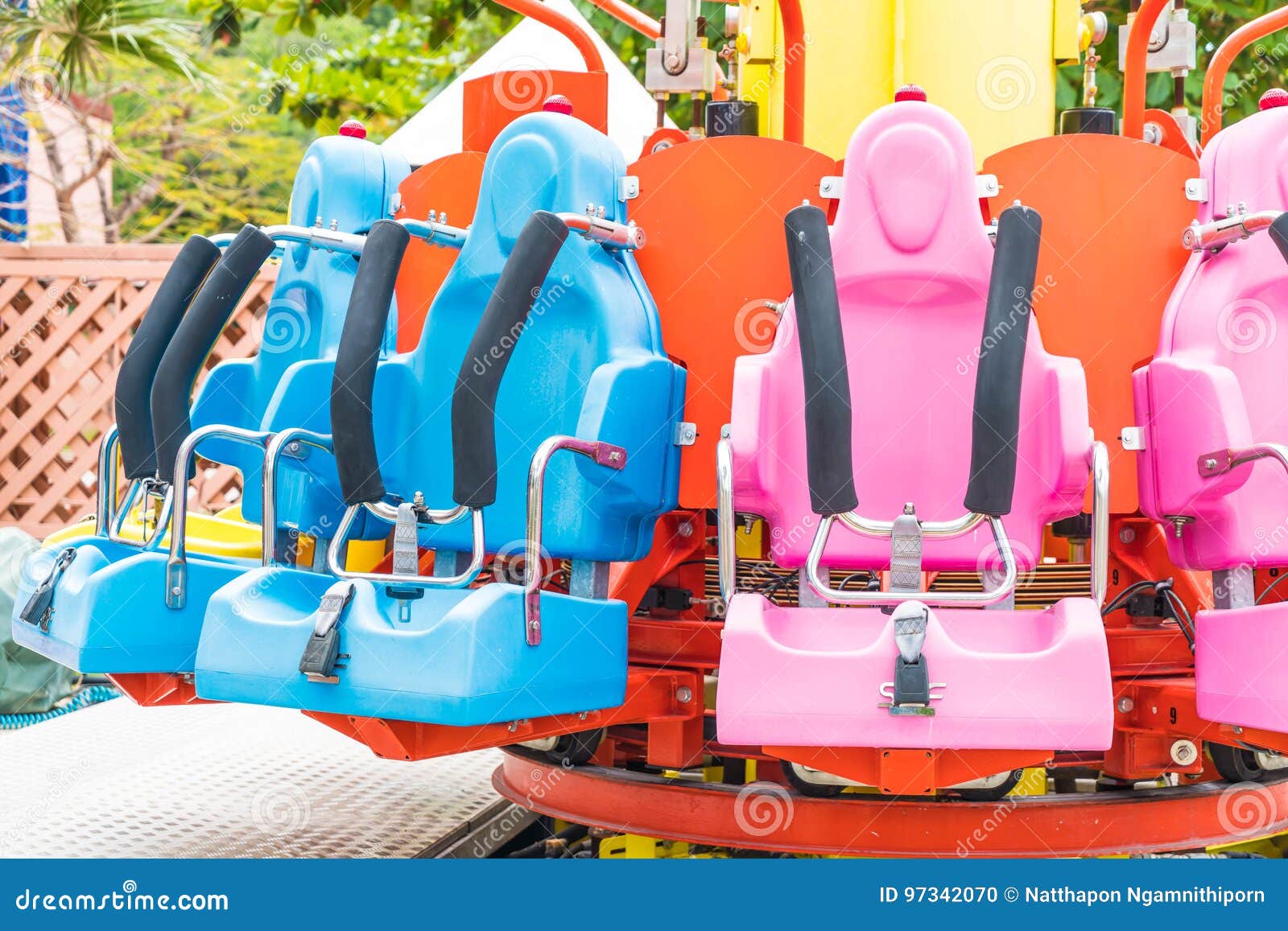 Colorful Roller Coaster Seats at Amusement Park Stock Photo - Image of ...